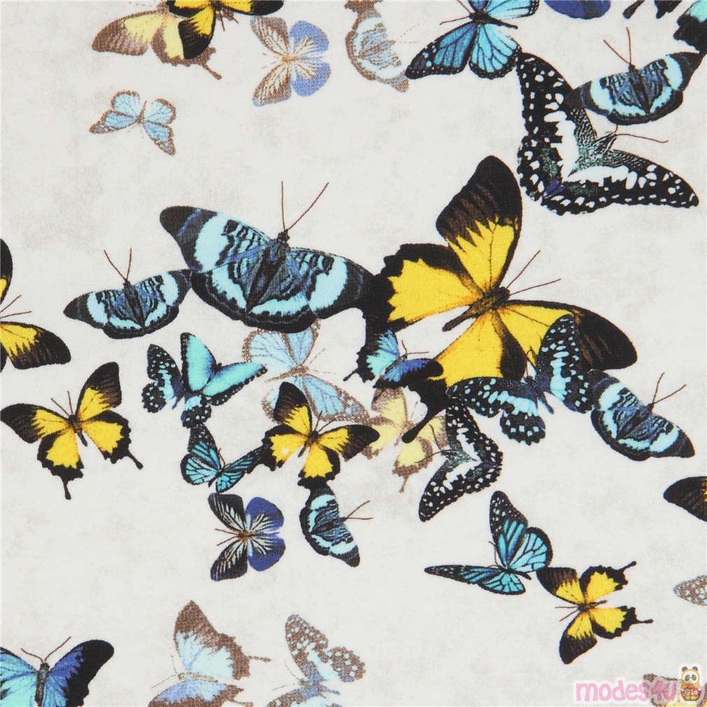 Stof Fabrics light cream knit fabric with butterflies Fabric by ...