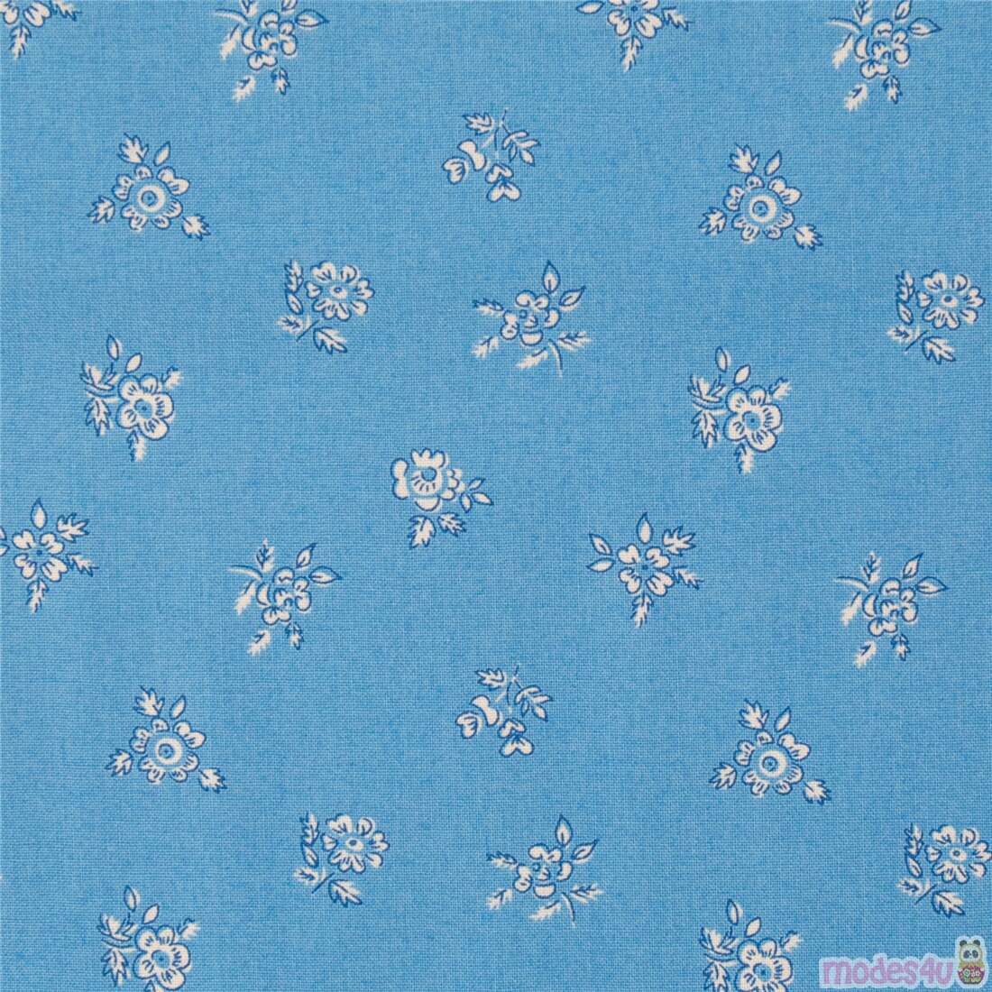 blue fabric with white outlined small tumbling bouquets by Liberty ...