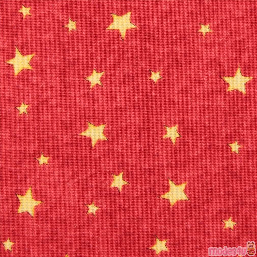 Roter Stoff mit kleinen gelben Sternen von Quilting Treasures Fabric by ...