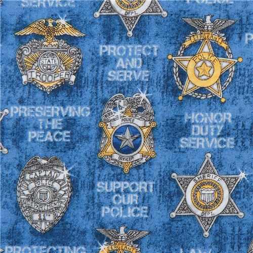 blue fabric with police badge text Quilting Treasures Fabric by ...