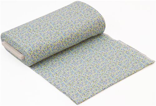 off white smooth knit fabric Japan with small blue flowers densely ...