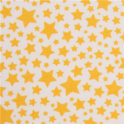 white Michael Miller fabric with many yellow stars Fabric by Michael ...